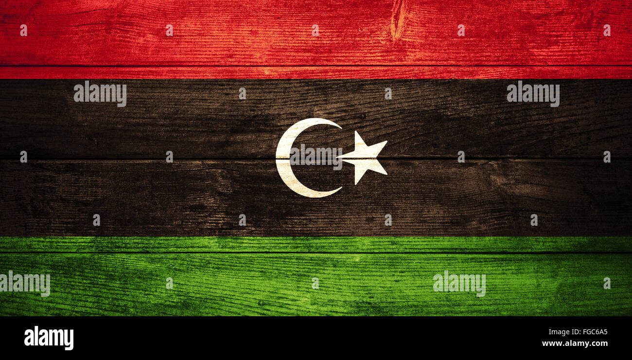 flag of Libya or Libyan banner on wooden background Stock Photo - Alamy
