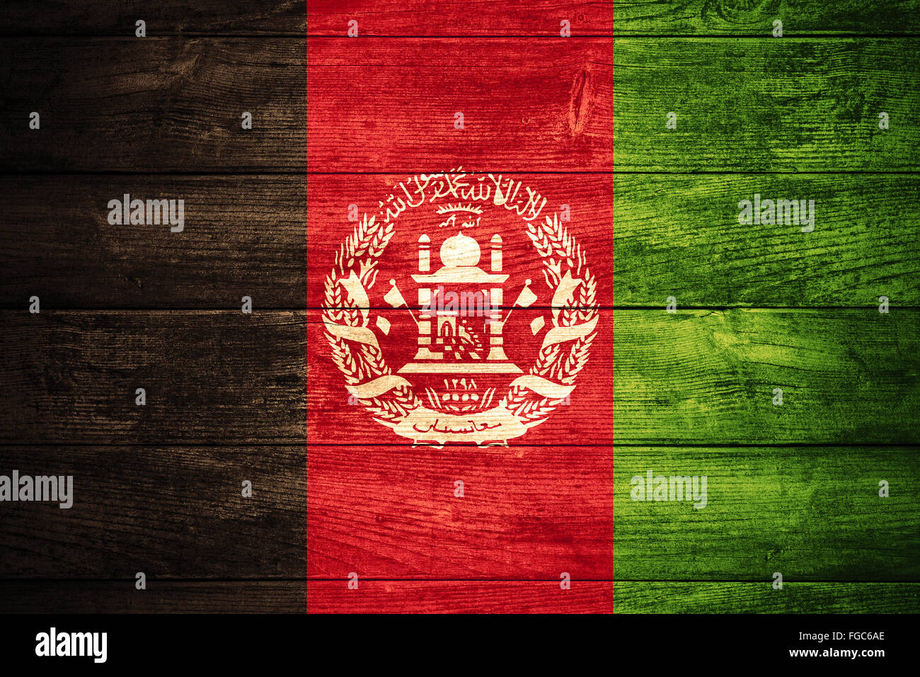 flag of Afghanistan or Afghan banner on wooden background Stock Photo ...