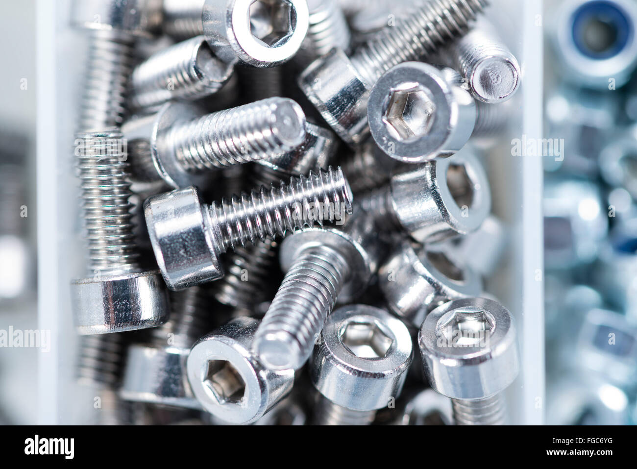 Different Screws and other Parts sorted in a box (close-up shot Stock ...