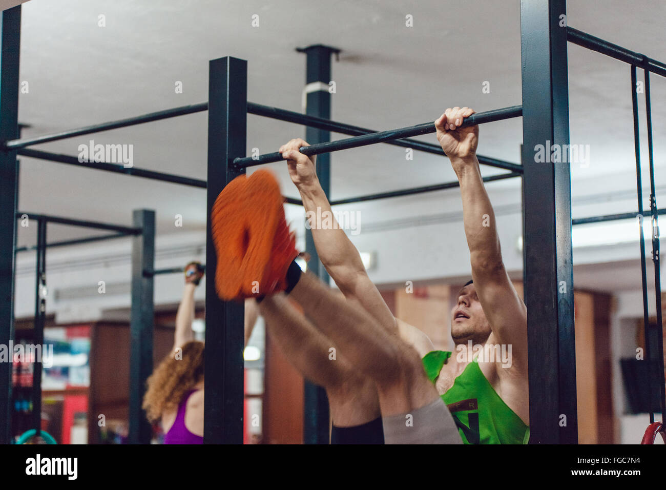 Man doing exercises on the horizontal bar Stock Photo - Alamy