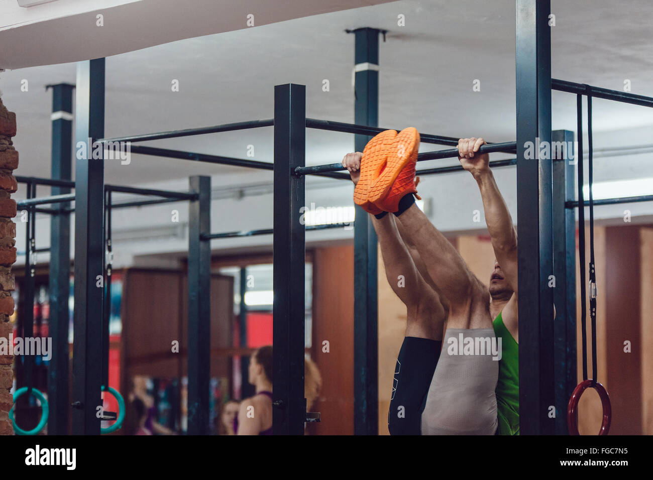 Man doing exercises on the horizontal bar Stock Photo - Alamy