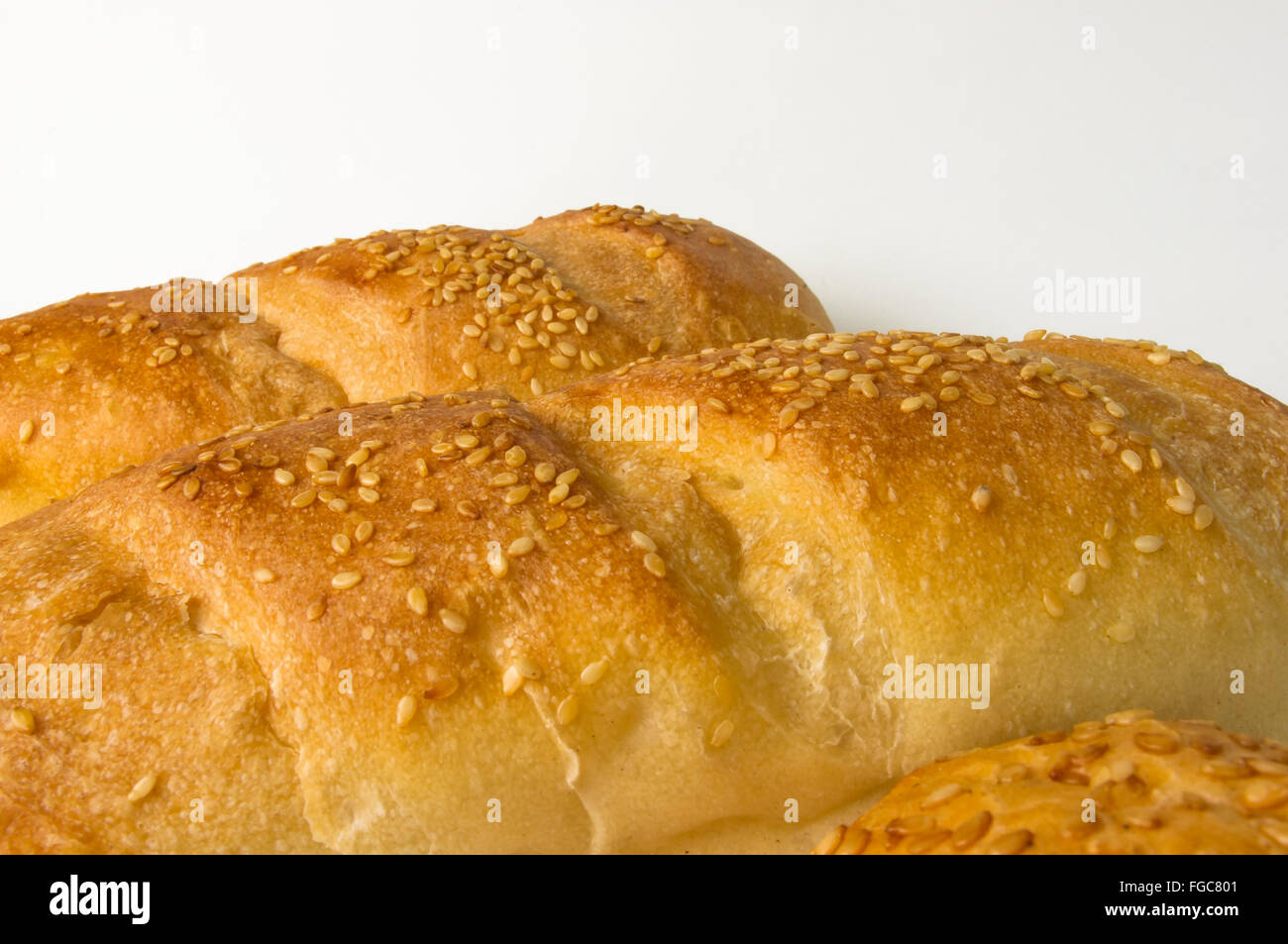 whole wheat two breads and bun on white background Stock Photo - Alamy