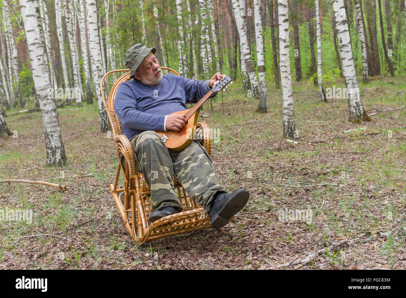 Old man rocking chair hi-res stock photography and images - Alamy