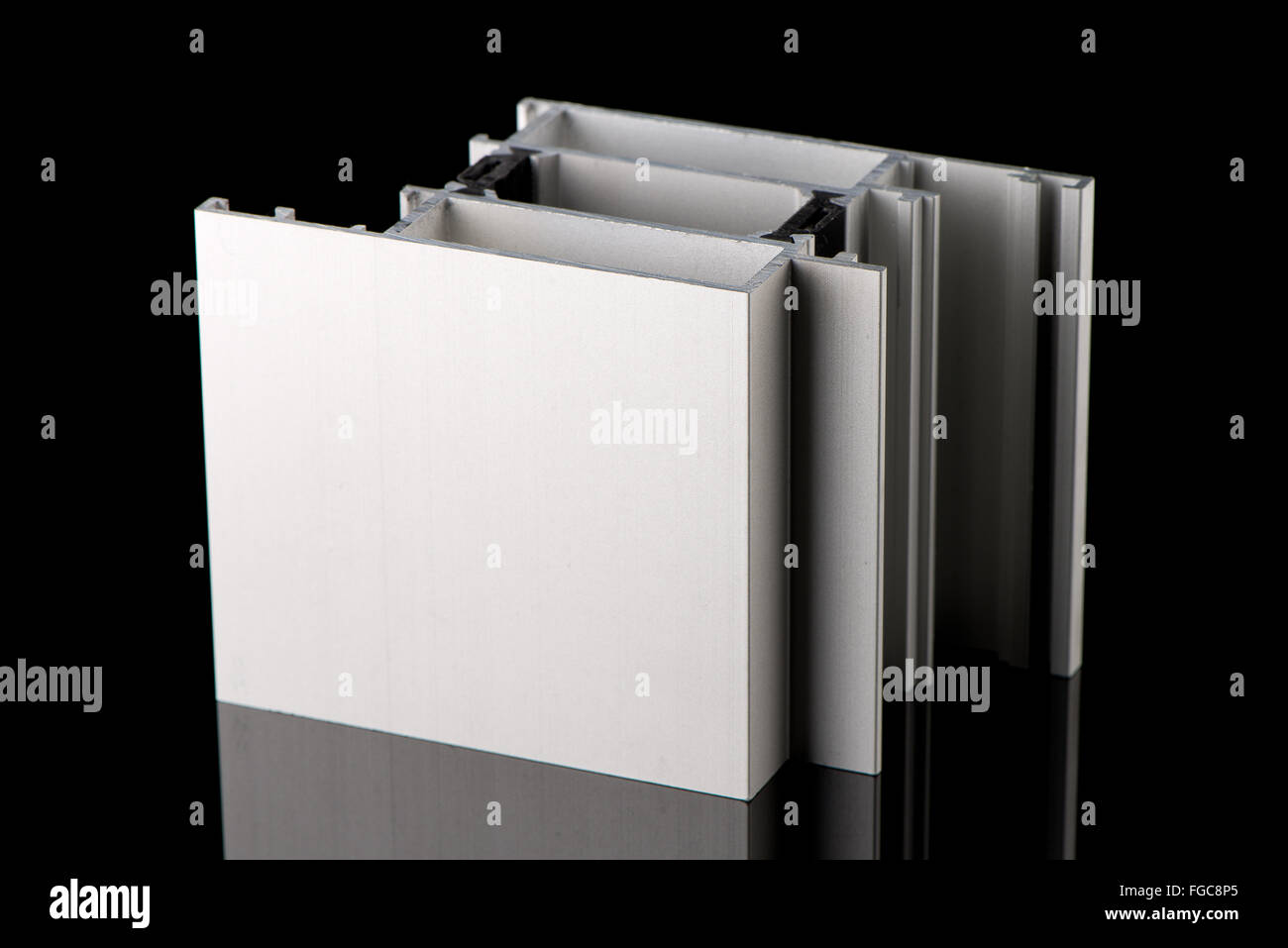 Aluminium profile sample isolated on black background Stock Photo - Alamy