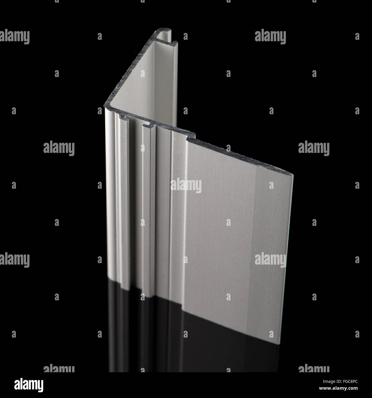 Aluminium profile sample isolated on black background Stock Photo - Alamy