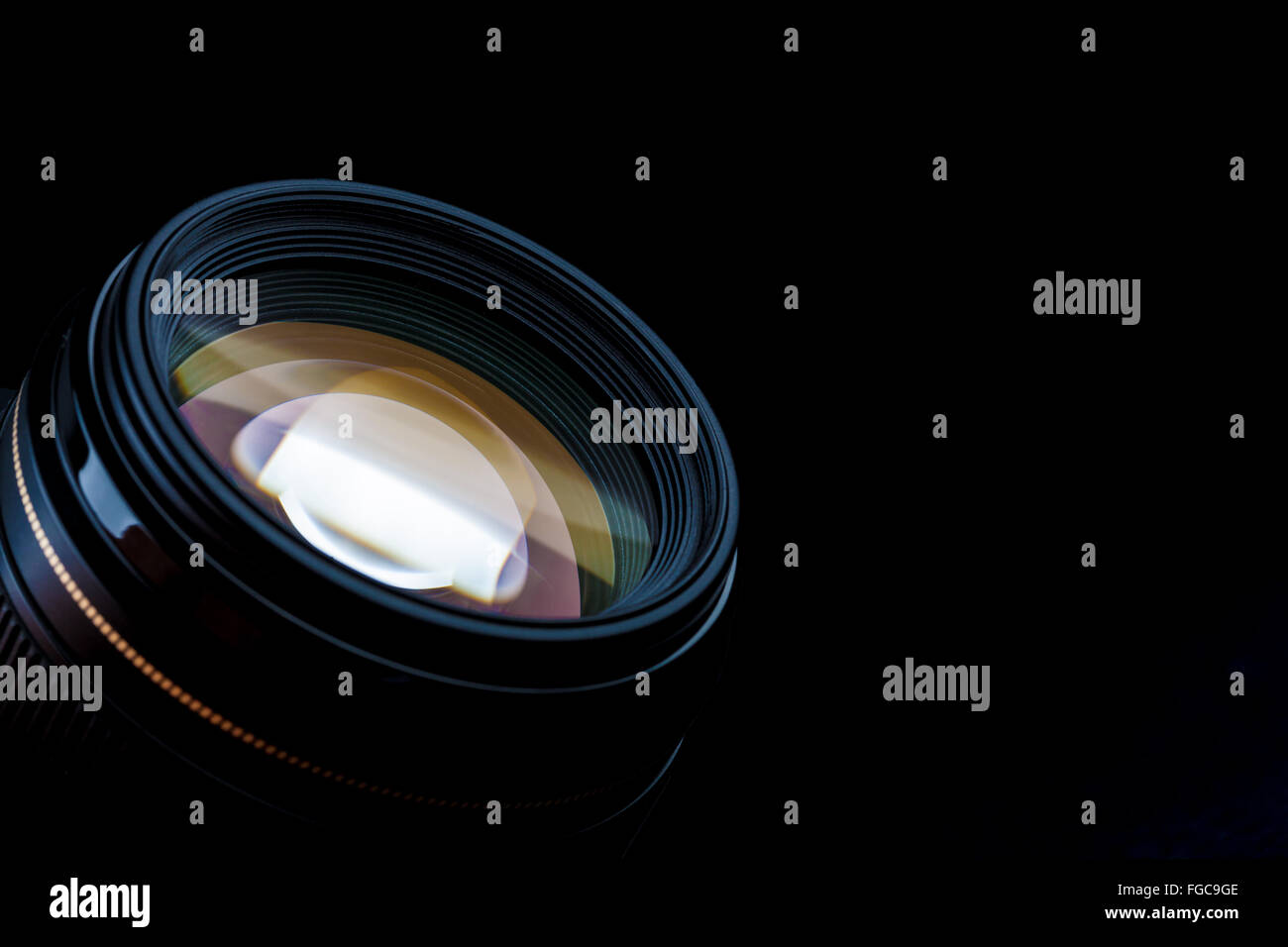 Camera photo lens facing up isolated on black background Stock Photo ...