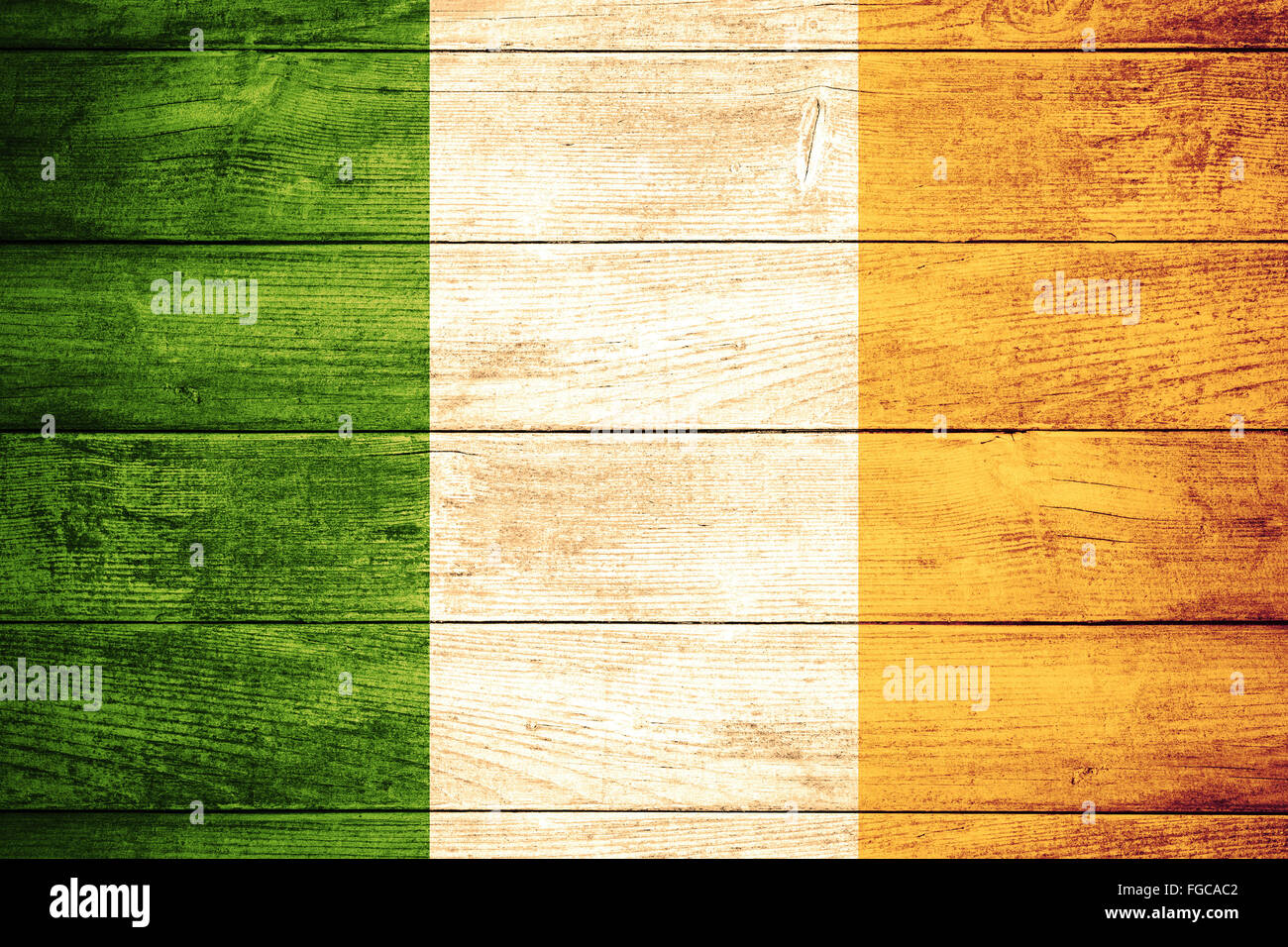 flag of Ireland or Irish banner on wooden background Stock Photo - Alamy