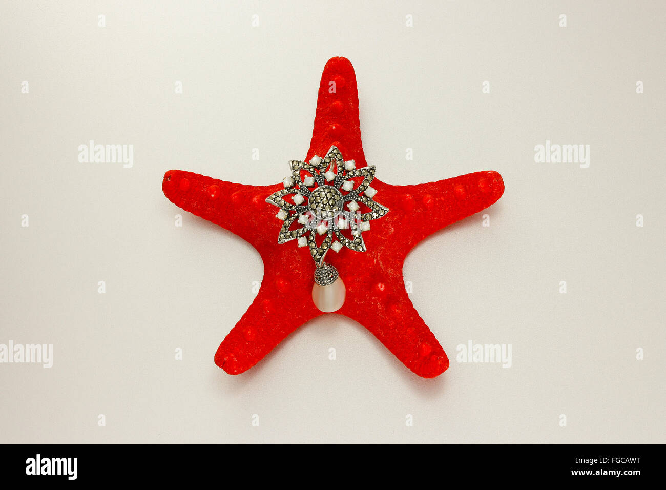 Starfish with a jewel on it Stock Photo - Alamy