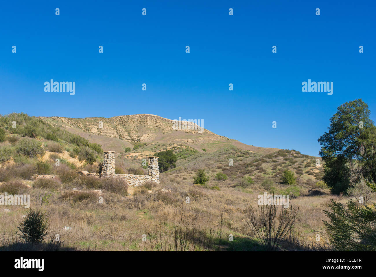 Stone column ruins among the hills of California wilderness Stock Photo ...