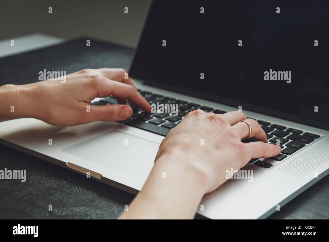 woman's hands working on laptop computer Stock Photo - Alamy