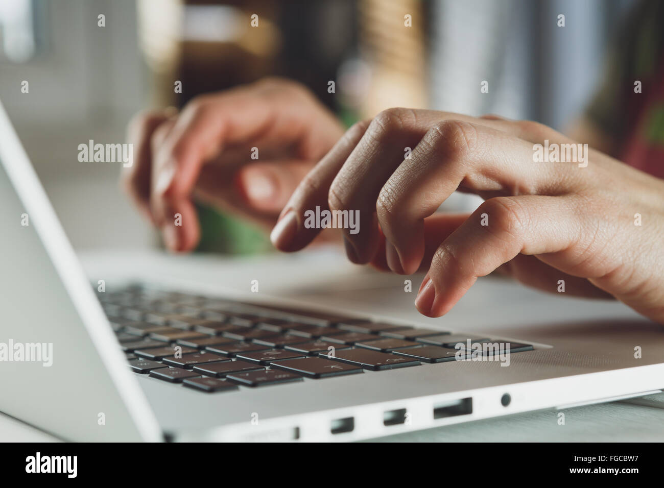 woman's hands working on laptop computer Stock Photo - Alamy