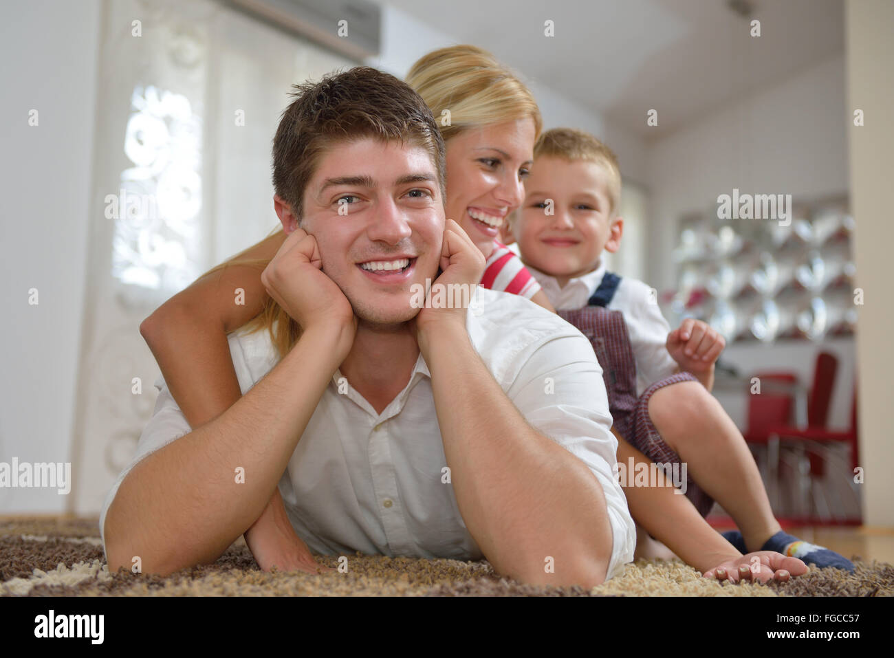 family at home Stock Photo - Alamy