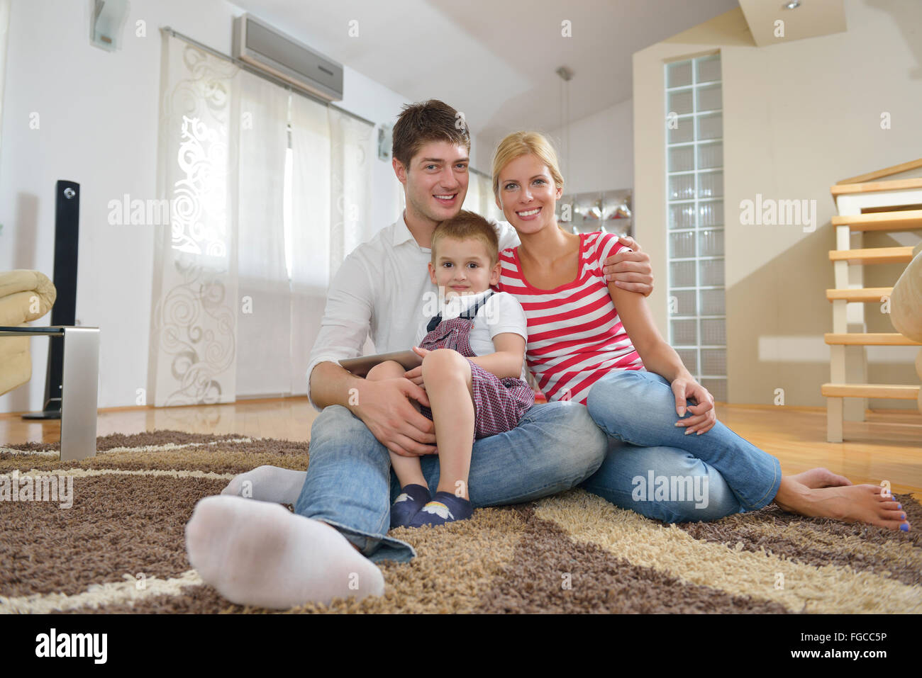 family at home Stock Photo - Alamy