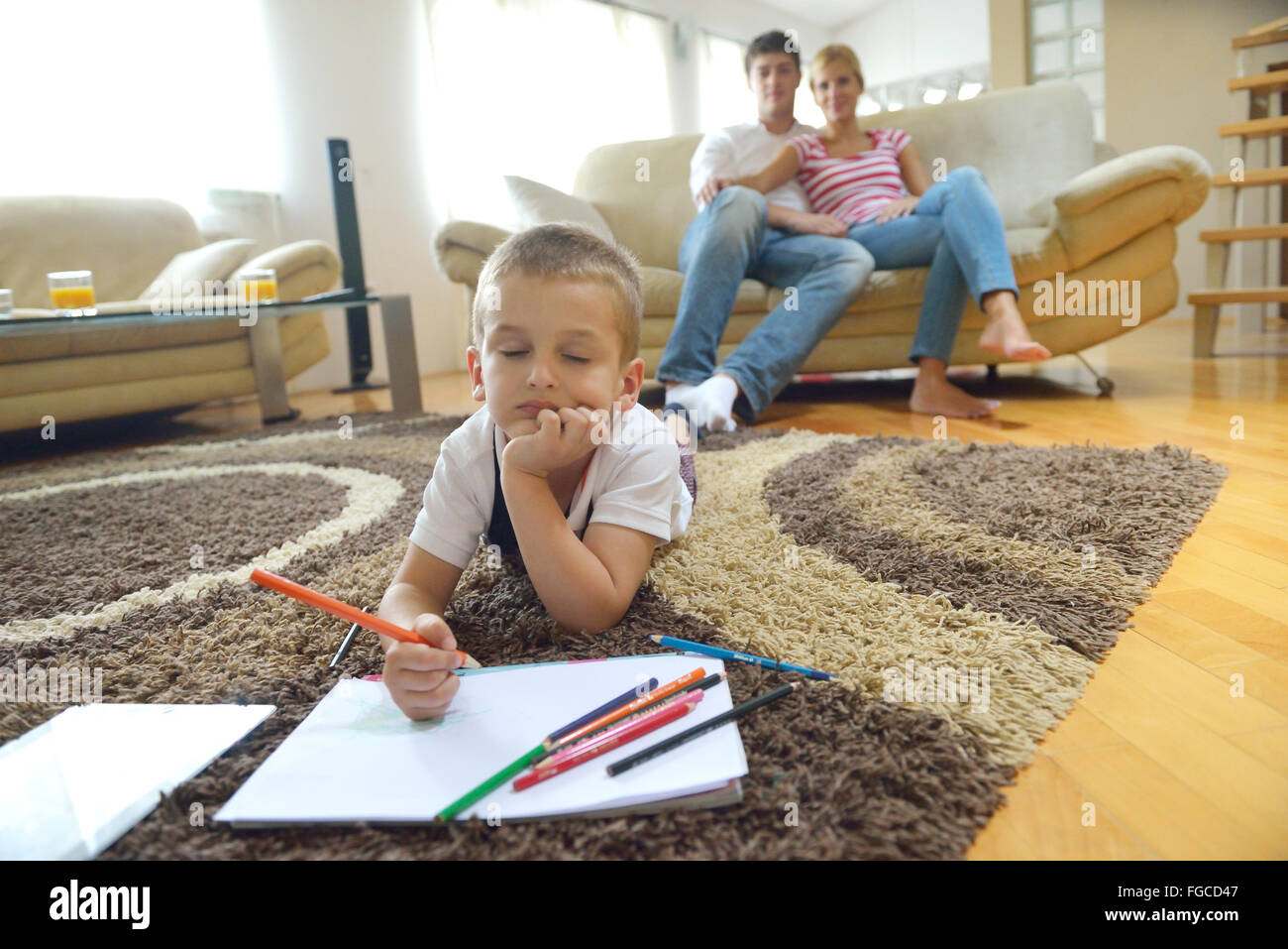 family at home Stock Photo - Alamy
