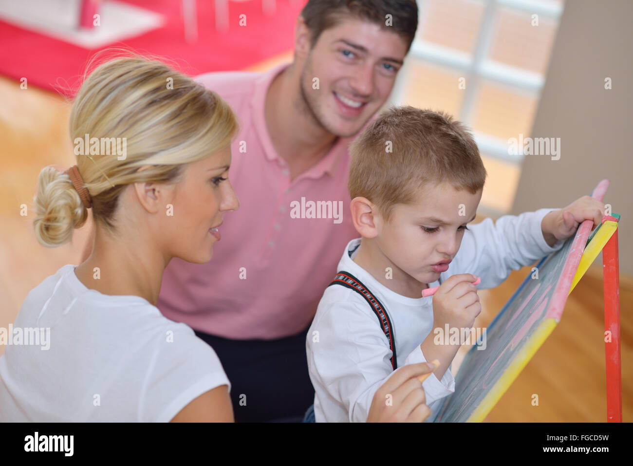 family drawing on school board at home Stock Photo - Alamy