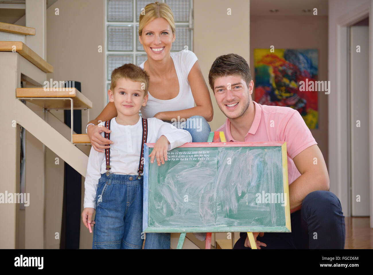 family drawing on school board at home Stock Photo - Alamy