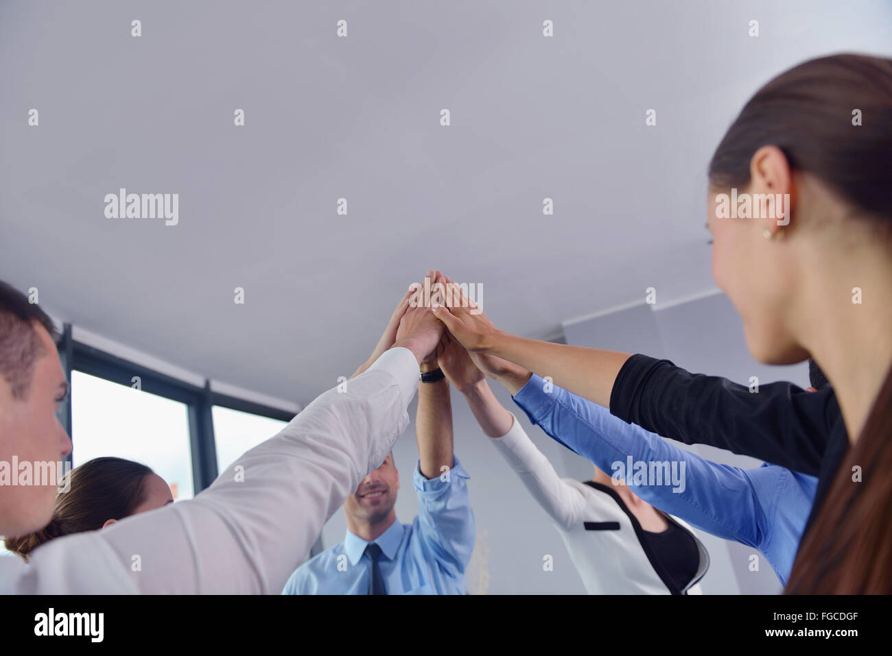 business people group joining hands Stock Photo - Alamy