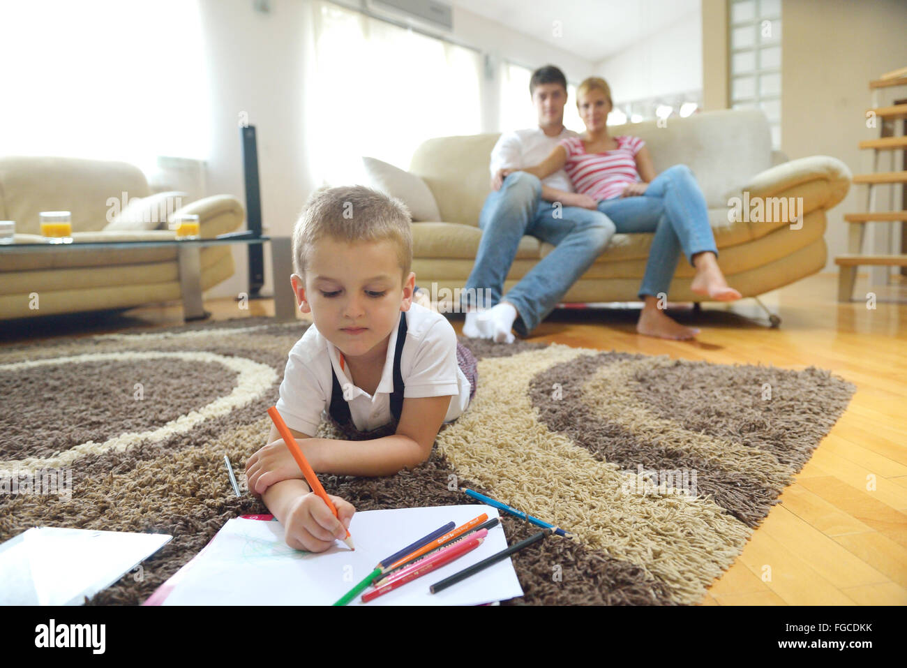 family at home Stock Photo - Alamy