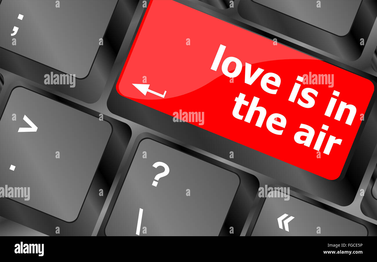 Modern keyboard with love is in the air text Stock Photo - Alamy