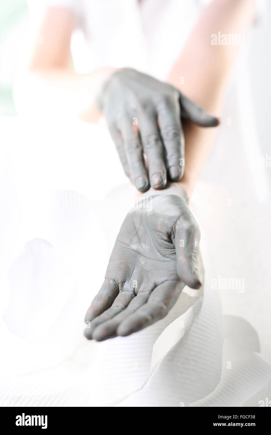 Women's hands during surgery cosmetic hands with the applied mask with ...