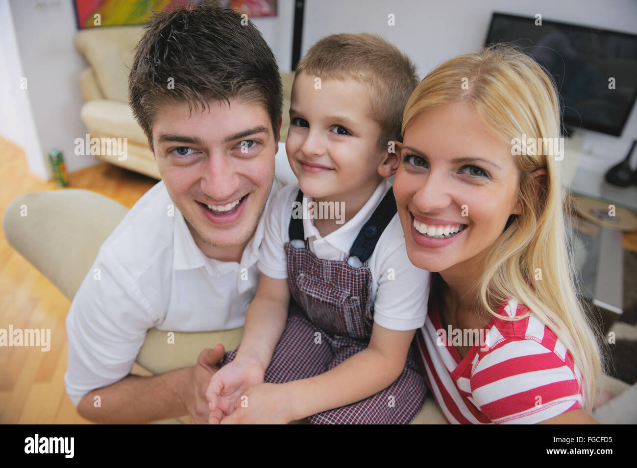 family at home Stock Photo - Alamy