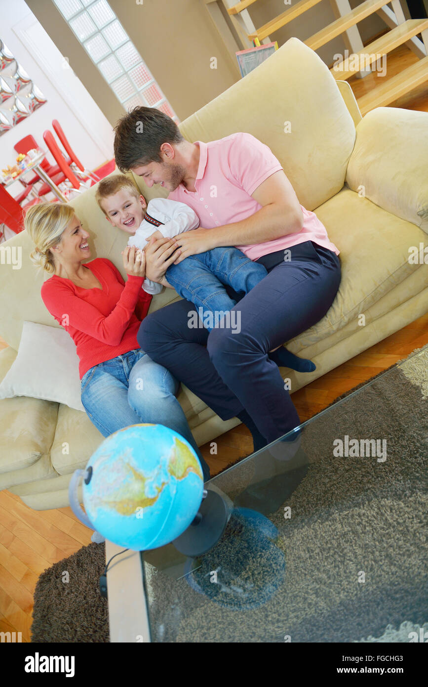 family have fun with globe Stock Photo - Alamy