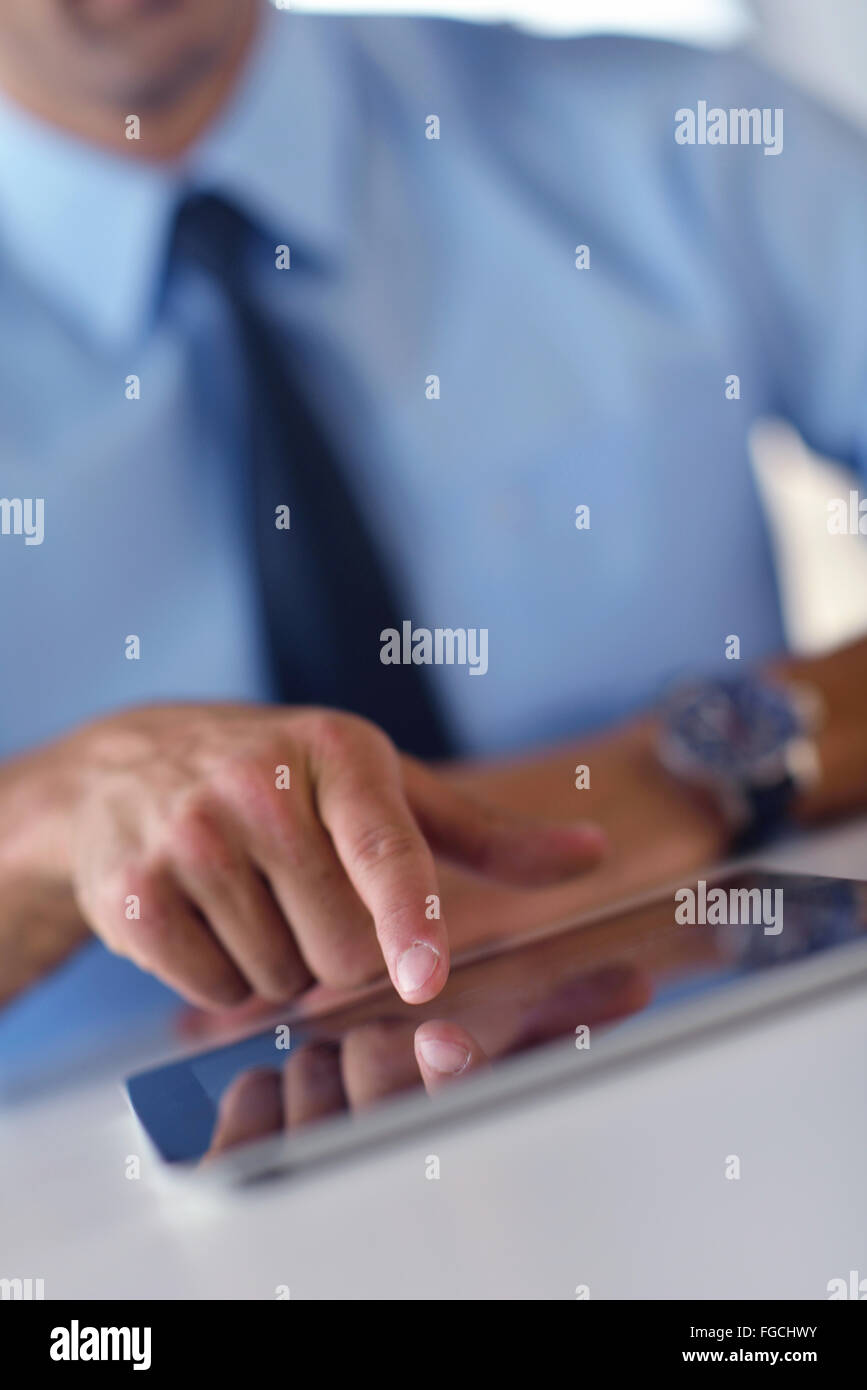 business man using tablet compuer at office Stock Photo - Alamy