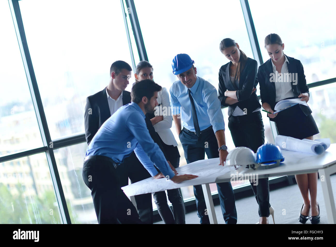 business people and engineers on meeting Stock Photo - Alamy