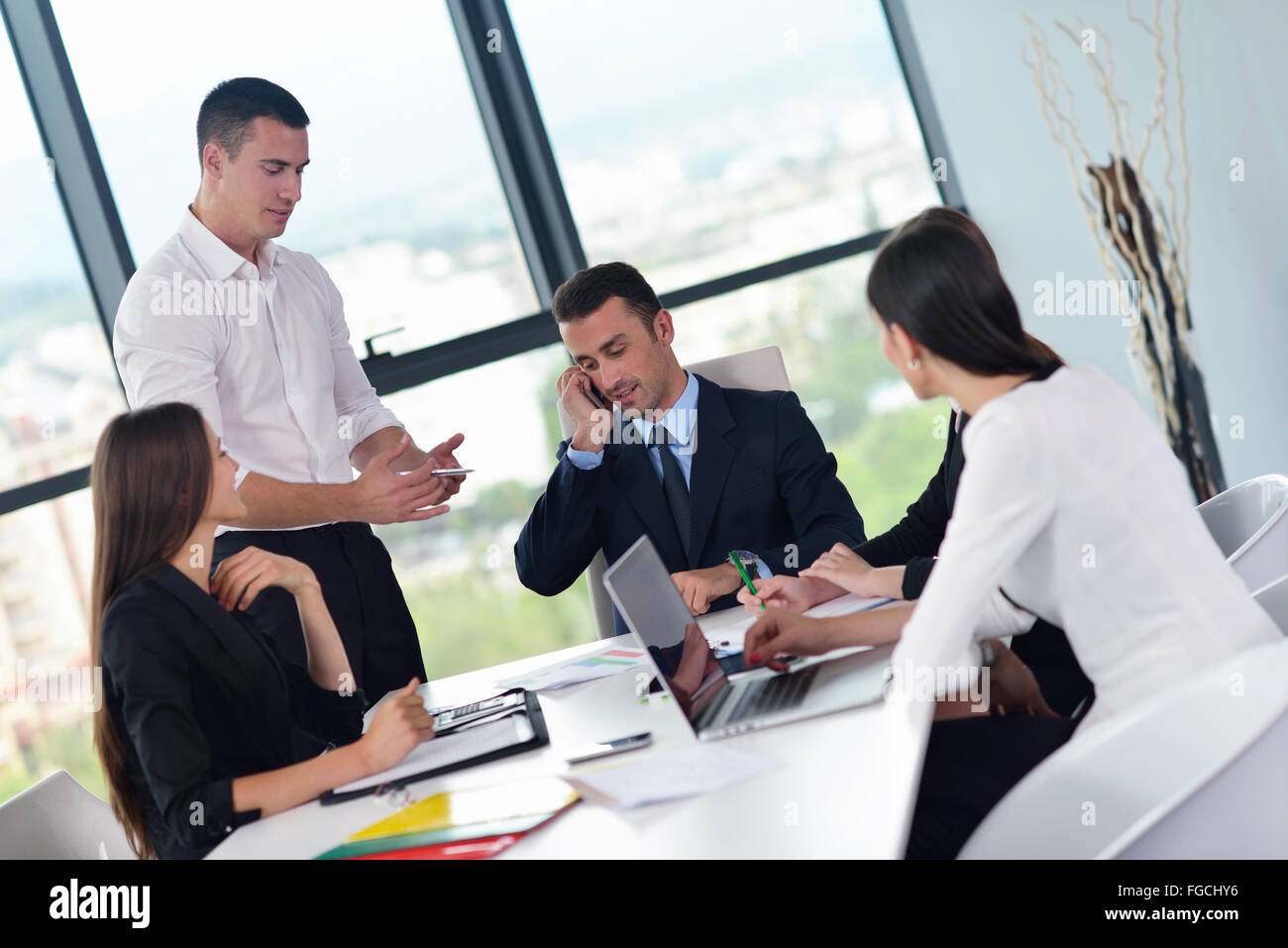 business people group in a meeting at office Stock Photo - Alamy