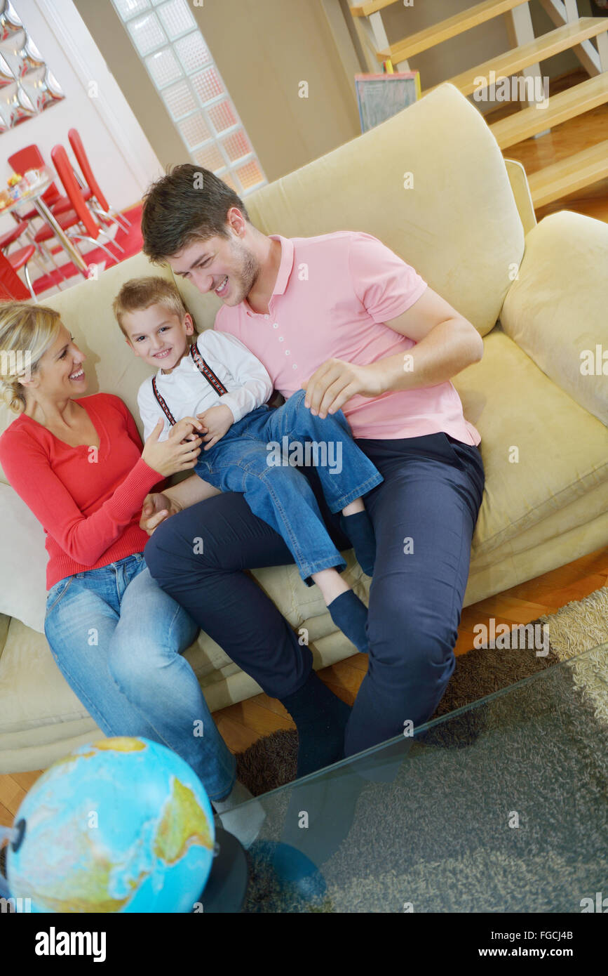 family have fun with globe Stock Photo - Alamy