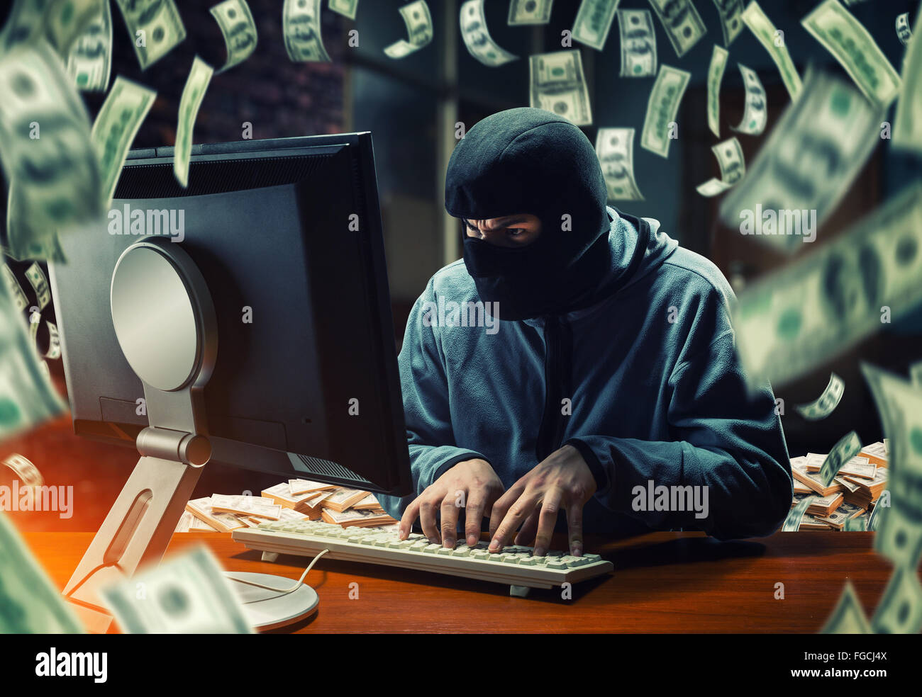 Hacker in the office Stock Photo - Alamy