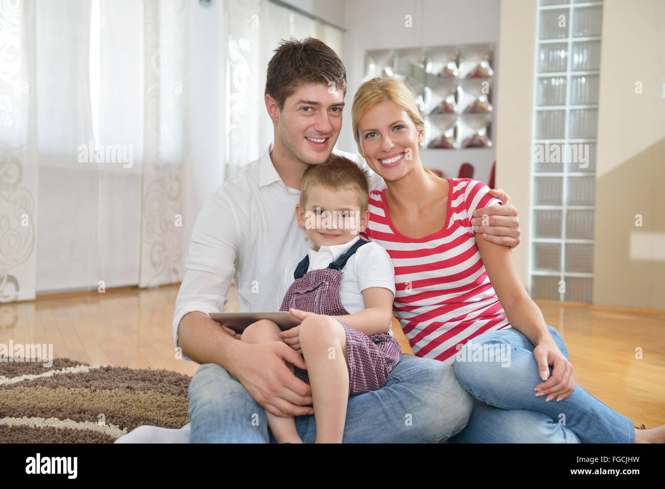 family at home Stock Photo - Alamy