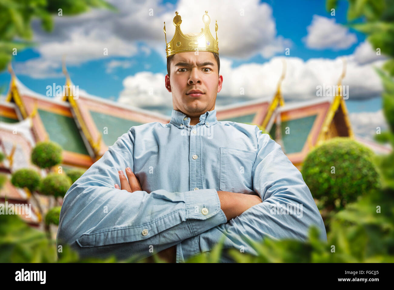 Serious man with crown Stock Photo - Alamy