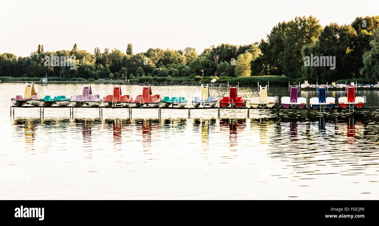 Colorful water bikes on the Balaton lake. Summer holiday Stock Photo ...