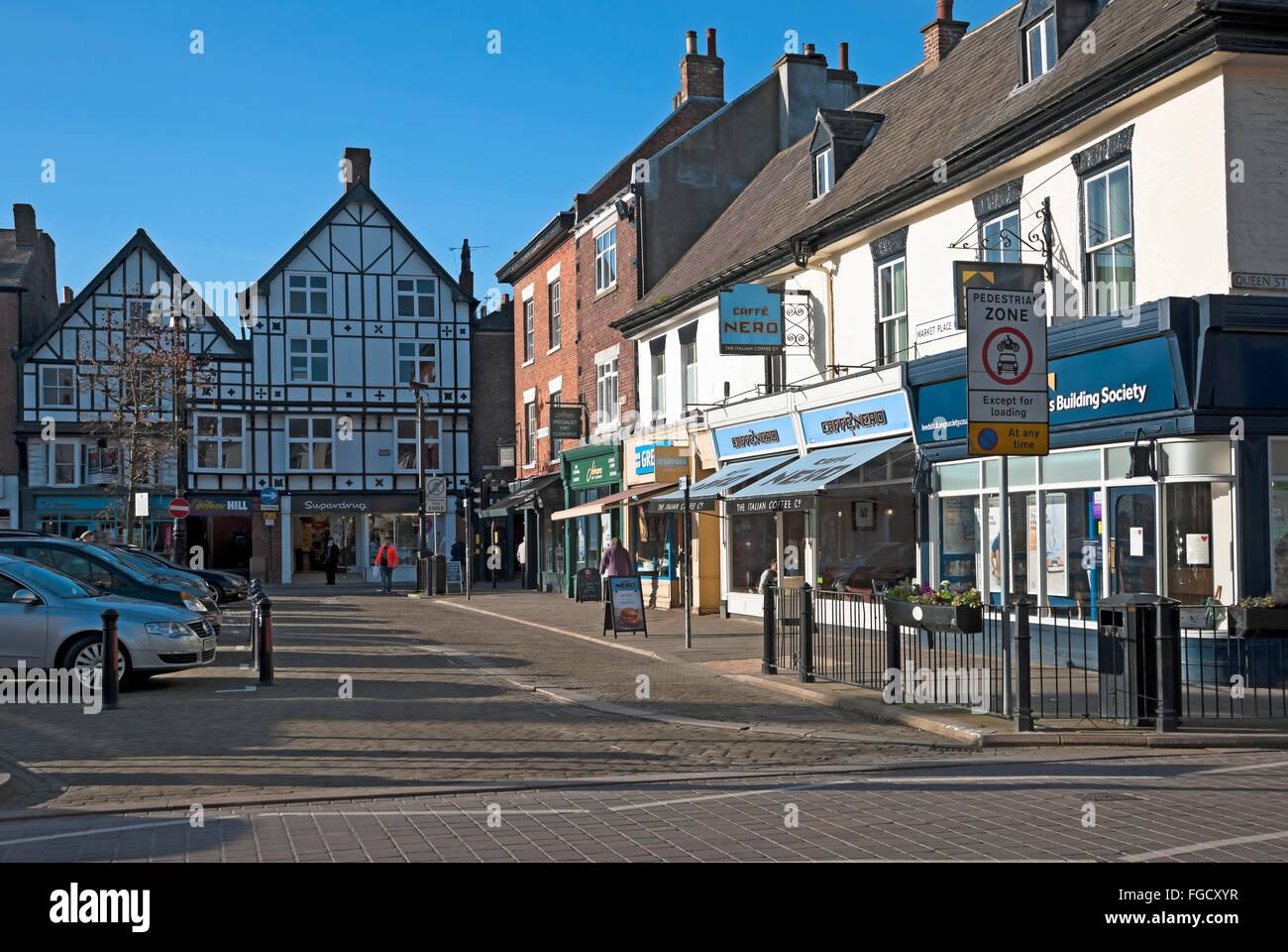 Shops stores in the Market Place in winter Ripon town centre North ...