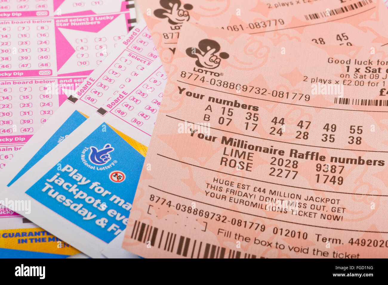 Close up of National Lottery Lotto jackpot tickets and slips ticket ...