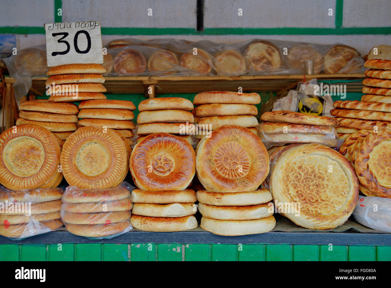 Traditional flat bread for sale at Karokol market, Kyrgyzstan Stock ...