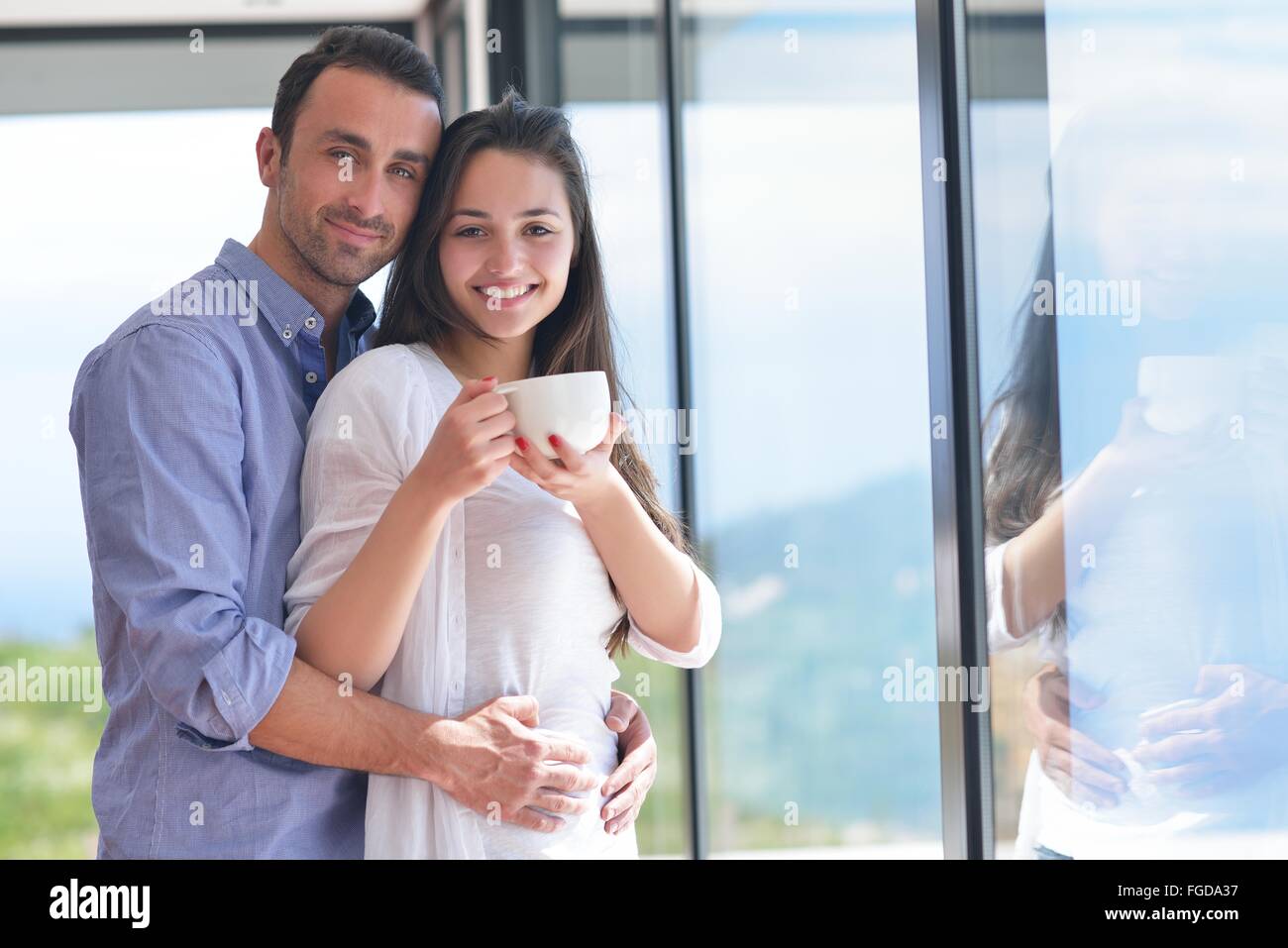 young couple relax at home Stock Photo - Alamy