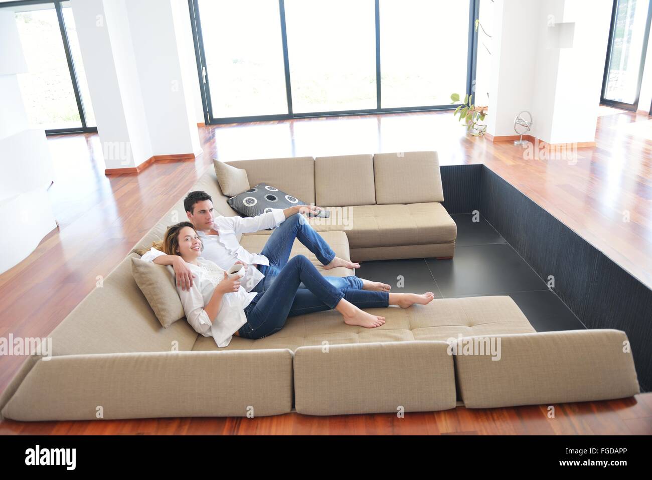 young couple relax at home Stock Photo - Alamy