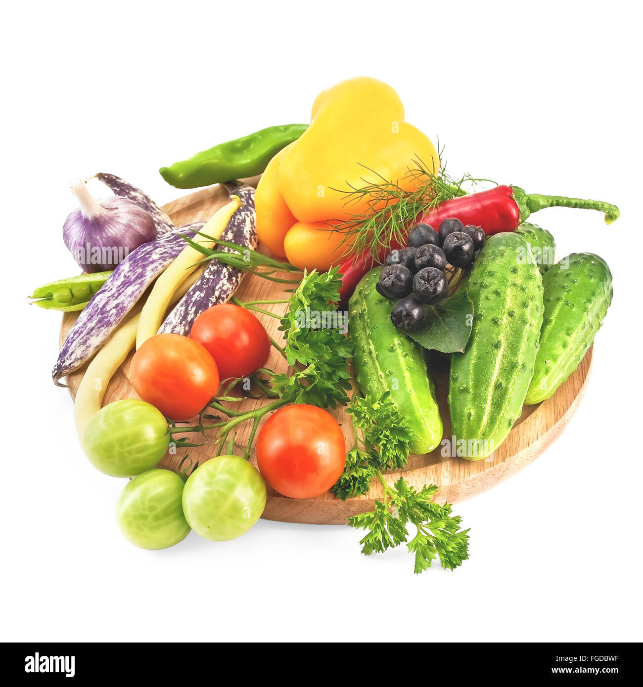 Vegetables on a round board Stock Photo - Alamy