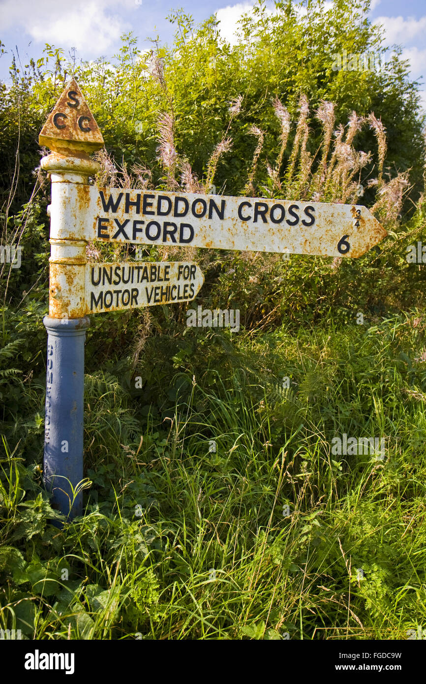 Metal road direction sign with distance to Wheddon Cross and Exford ...