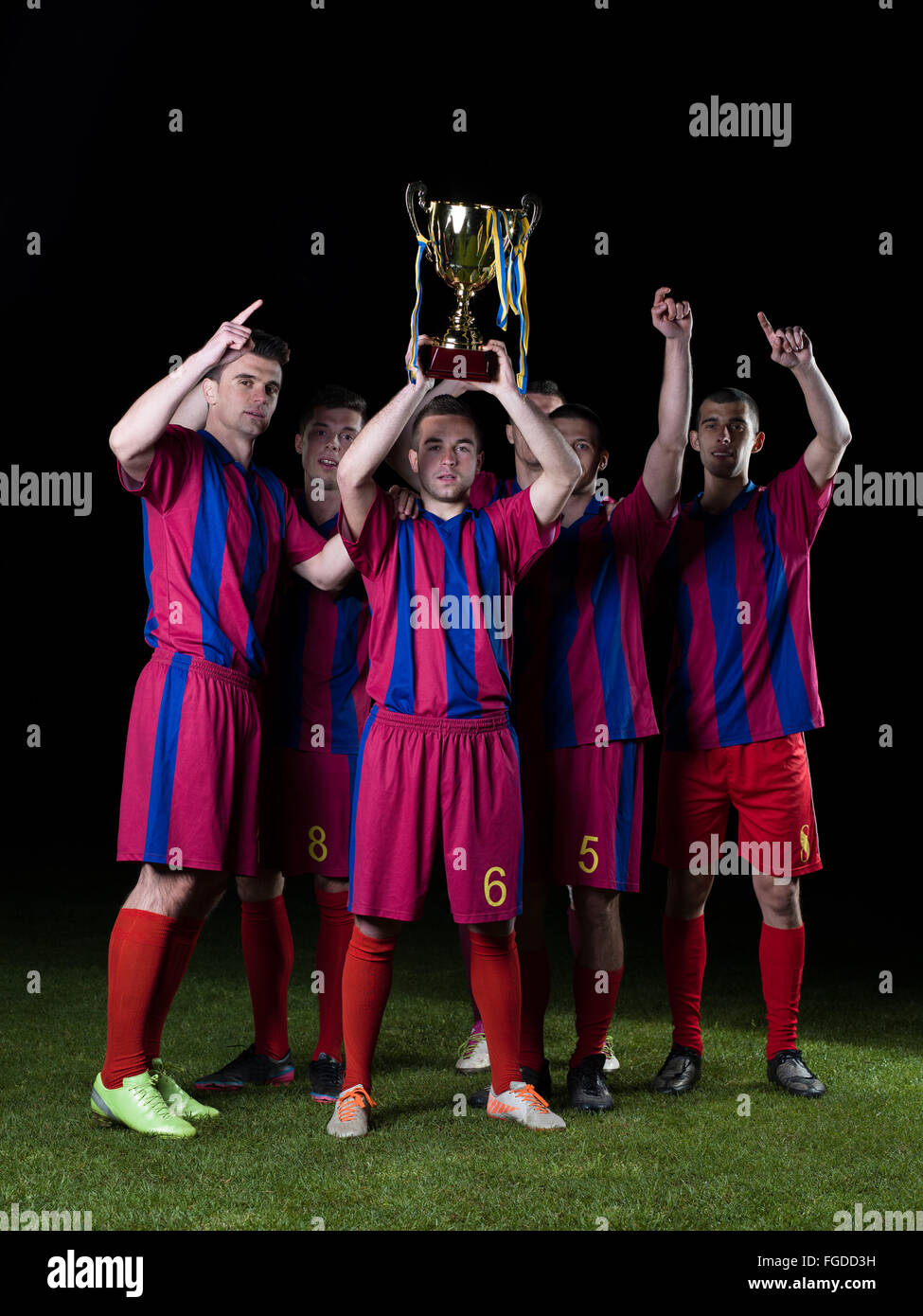soccer players celebrating victory Stock Photo - Alamy