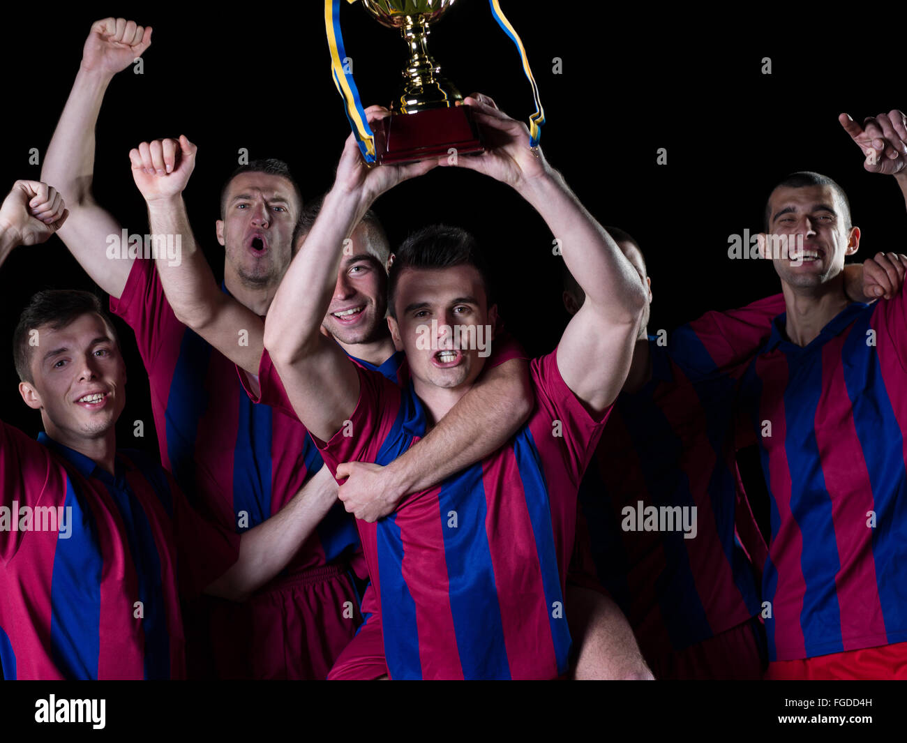 soccer players celebrating victory Stock Photo - Alamy