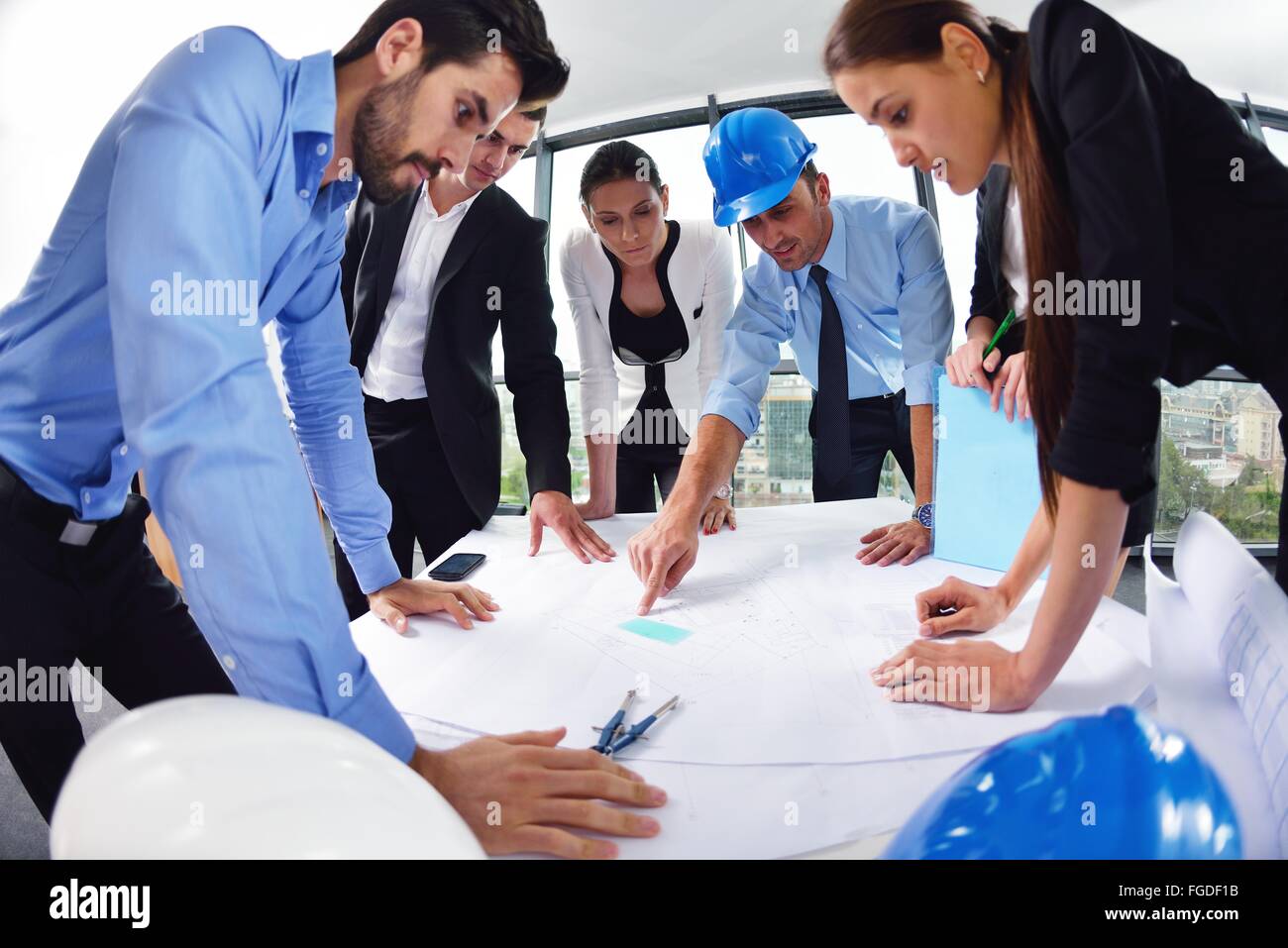 business people and engineers on meeting Stock Photo - Alamy