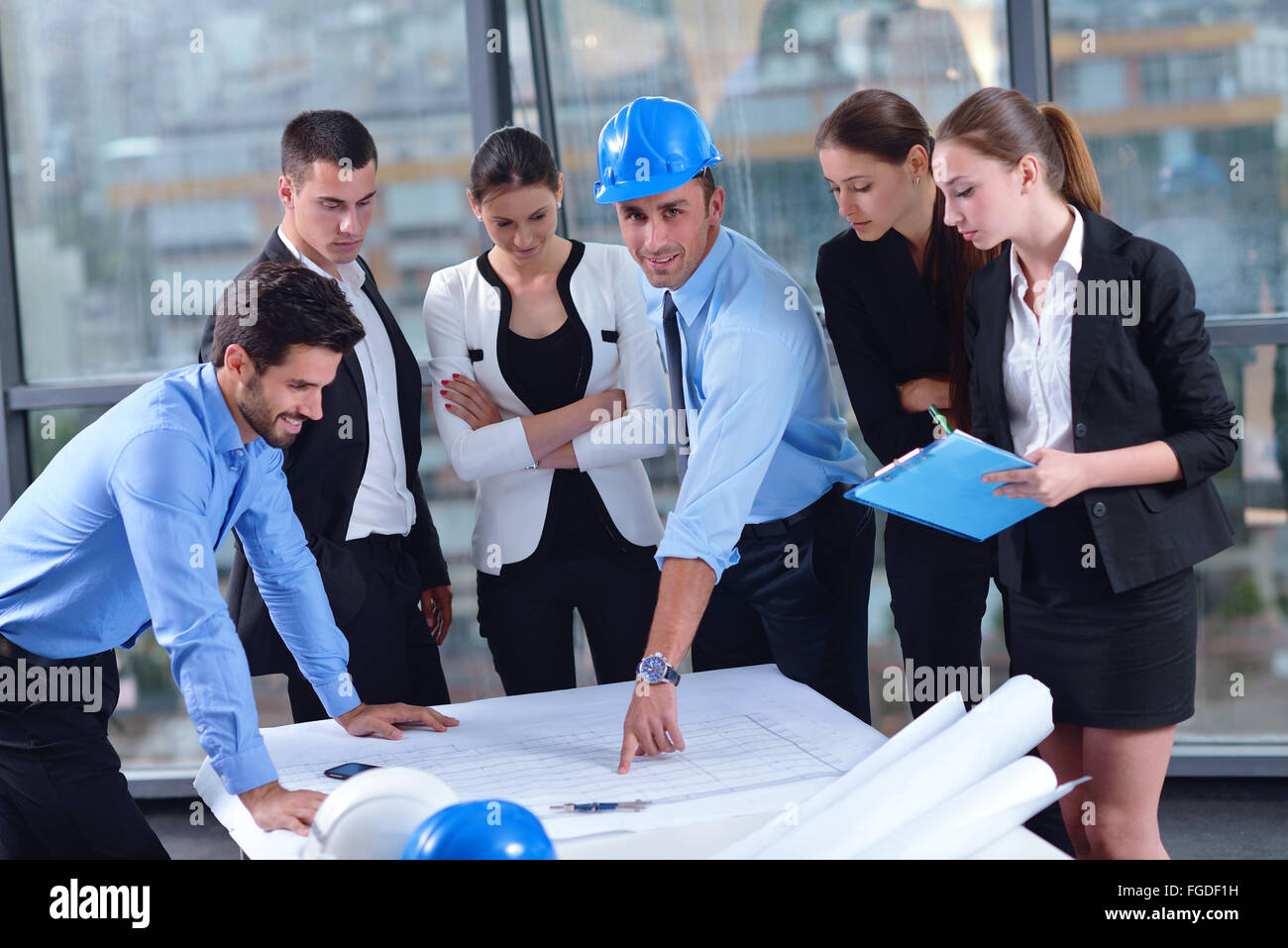 business people and construction engineers on meeting Stock Photo - Alamy
