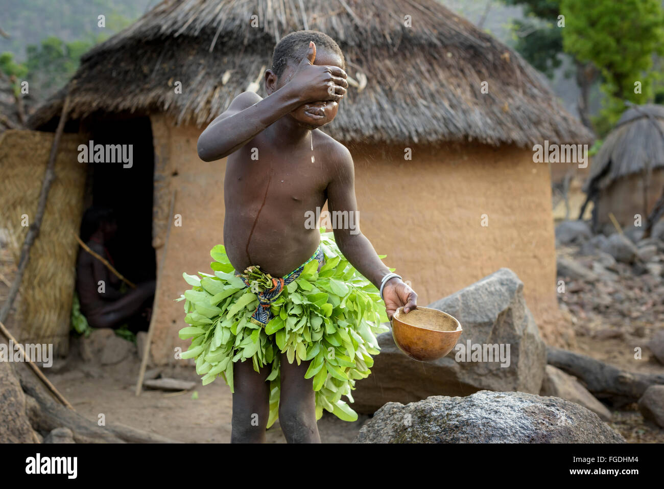 Koma girl from the Atlantika mountains dressed with traditional leaves ...