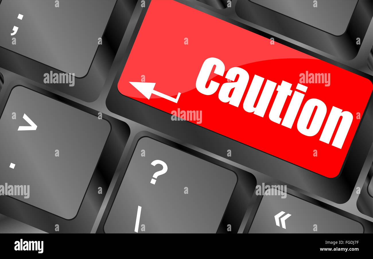 caution keyboard key showing business insurance concept Stock Photo - Alamy