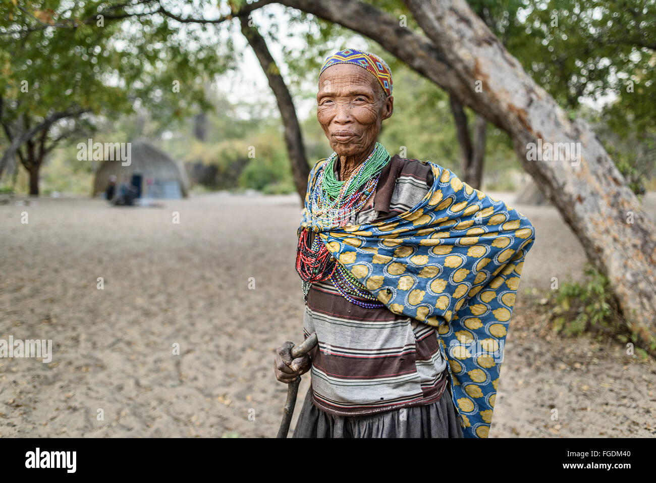 Portrait of a woman from the San tribe in a remote part of the Kalahari ...