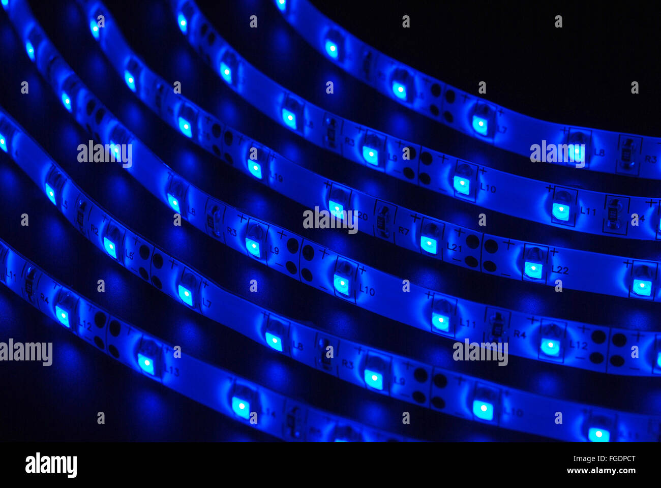 Blue led strip on the black background Stock Photo - Alamy
