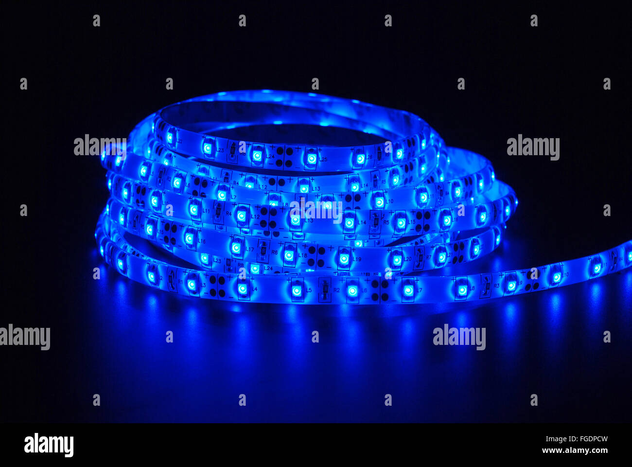 Blue led strip on the black background Stock Photo - Alamy